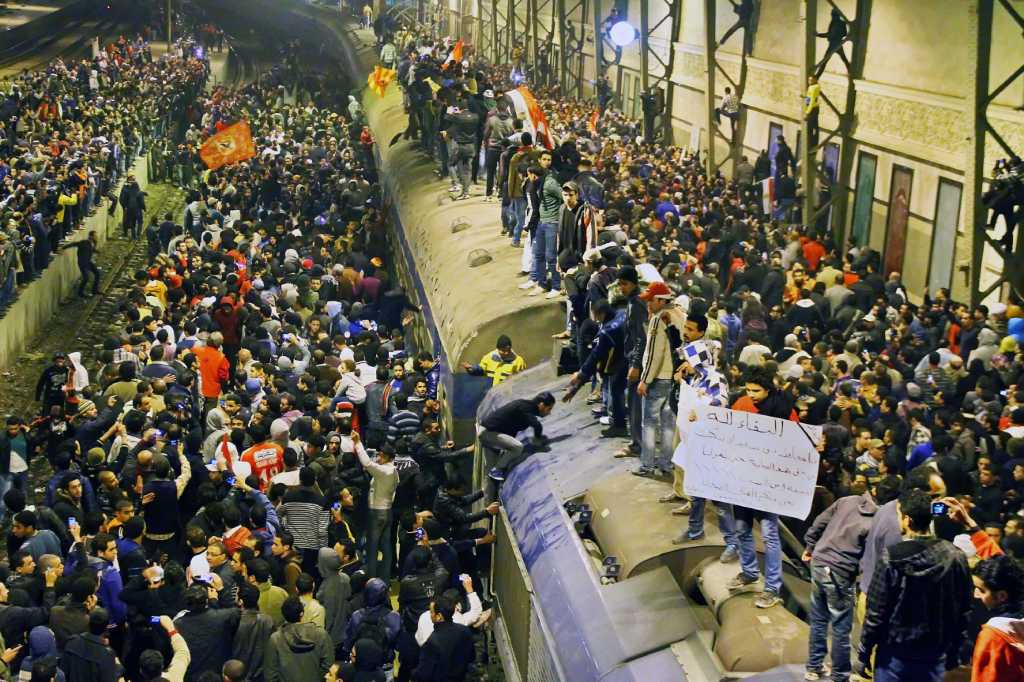 News of the word in photos: Soccer riot aftermath and more