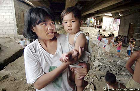 Philippine Poor Cast Wary Eye on New Regime / Former leader raised ...