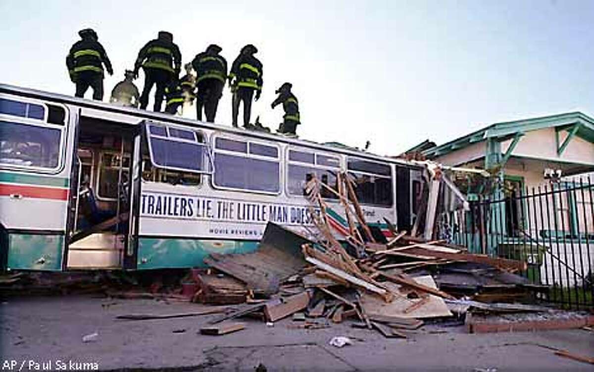 AC Bus, Struck By Truck, Careens Into Oakland Houses