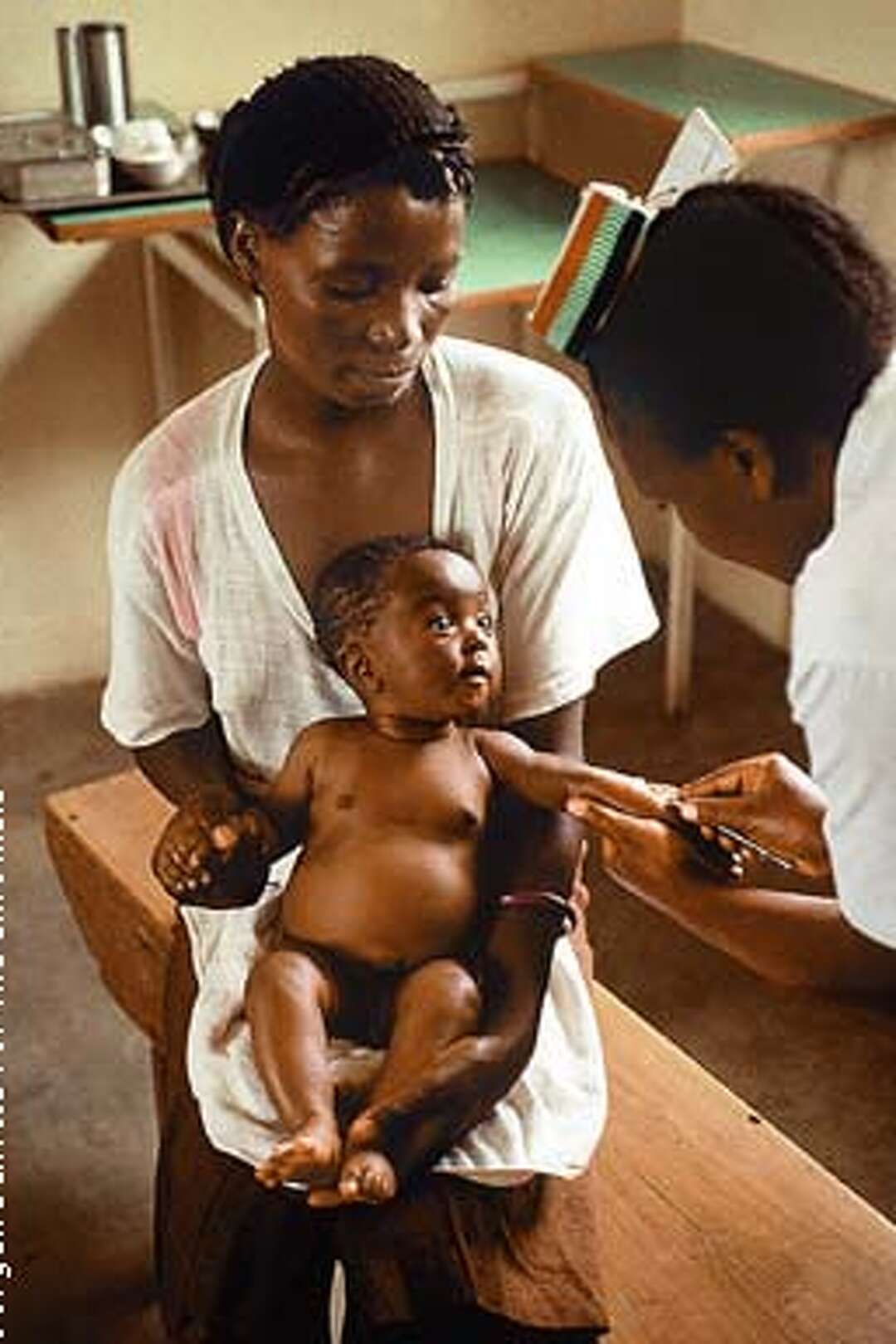 DEADLY NEEDLES / Epidemic's Devastating Toll