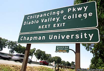 Signs of the Time / Highway guideposts double as drive-by ...