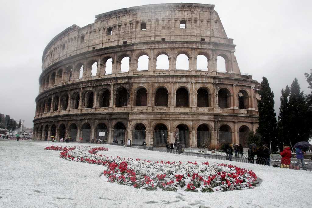 Snow falls in Rome as Italy is hit by cold snap