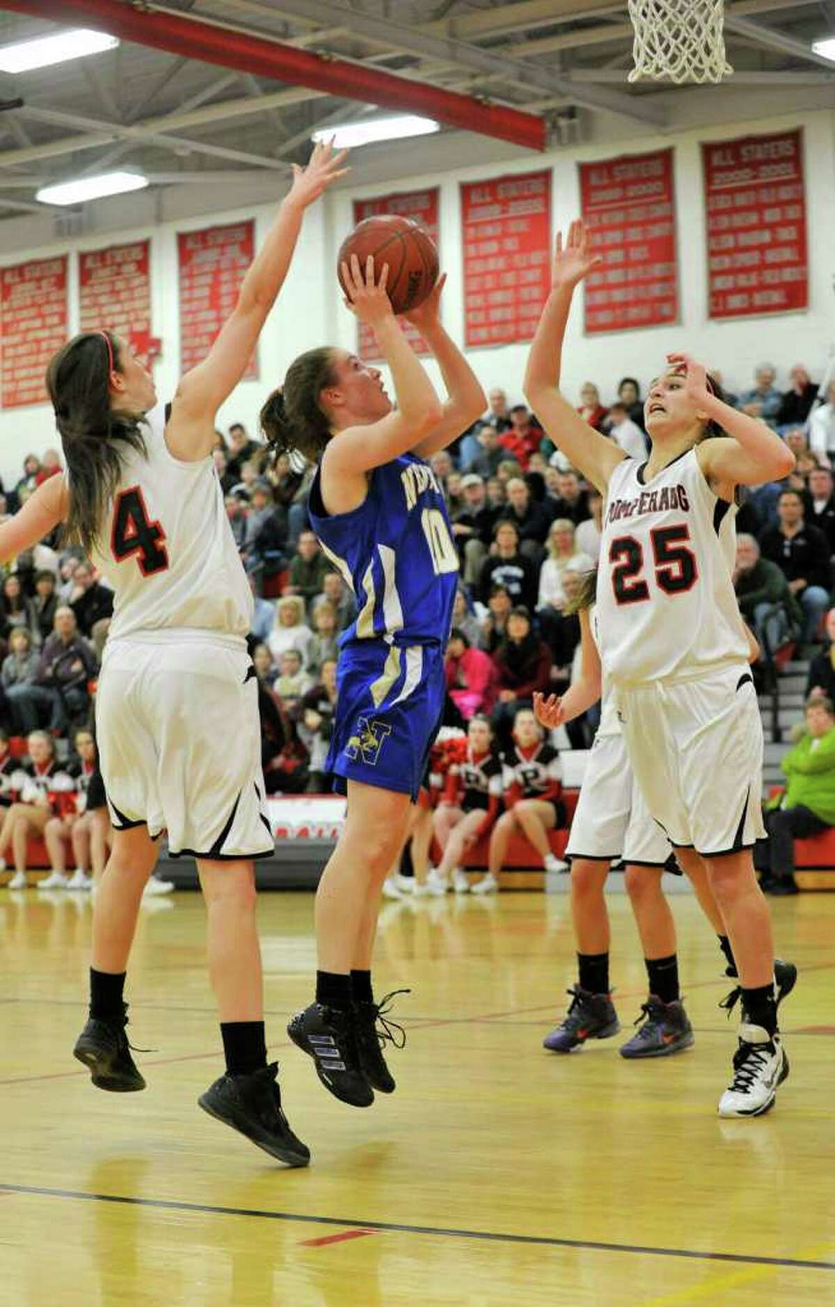 Pomperaug girls basketball tops Newtown in SWC showdown