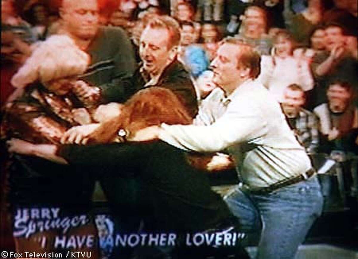 Punch-Drunk on Ratings / A hard-hitting look at pugilistic "Jerry Springer Show"