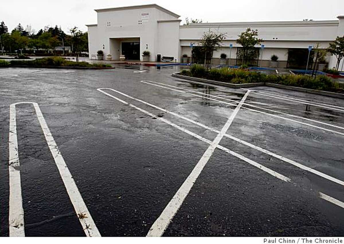Empty big-box stores drag down their neighbors