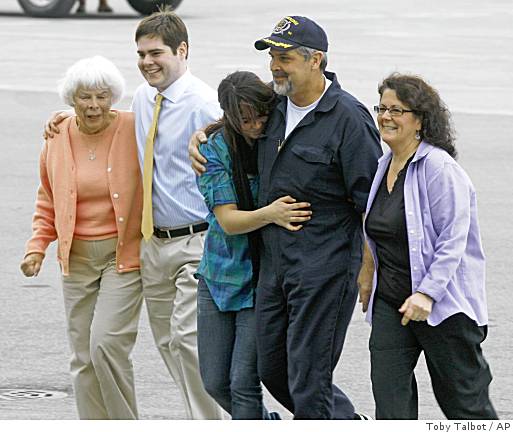 Rescued captain is home, a reluctant celebrity