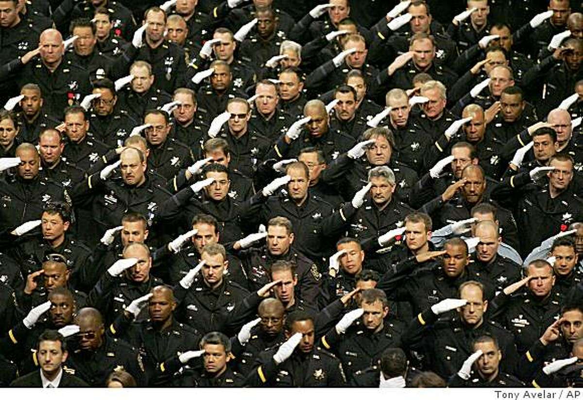 More than 20,000 honor slain Oakland police