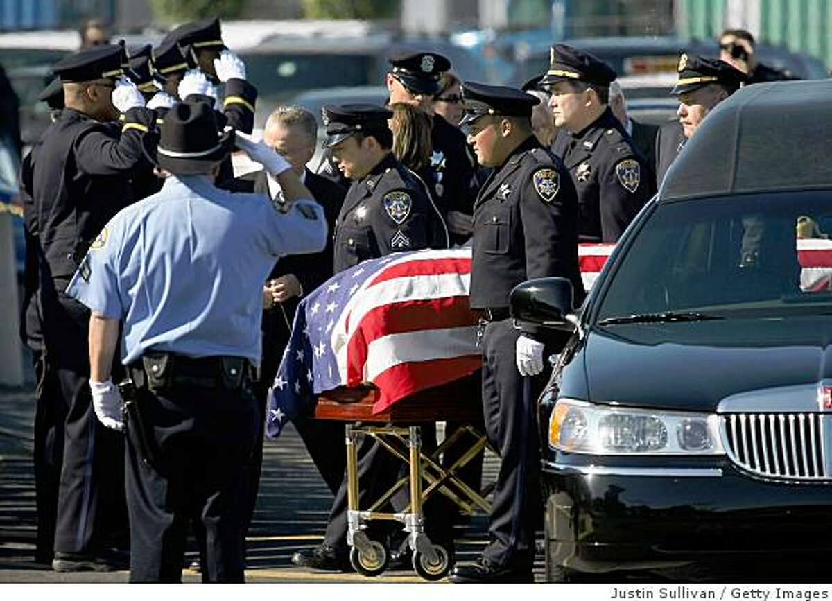 More than 20,000 honor slain Oakland police