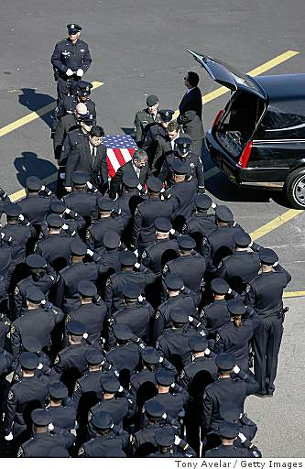 More than 20,000 honor slain Oakland police