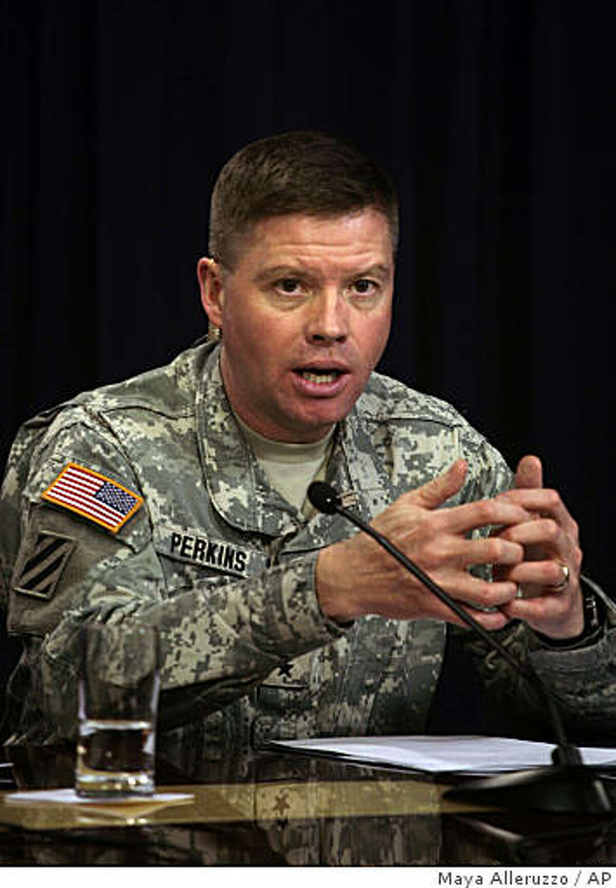 U.S. to cut 12,000 GIs in Iraq over 6 months