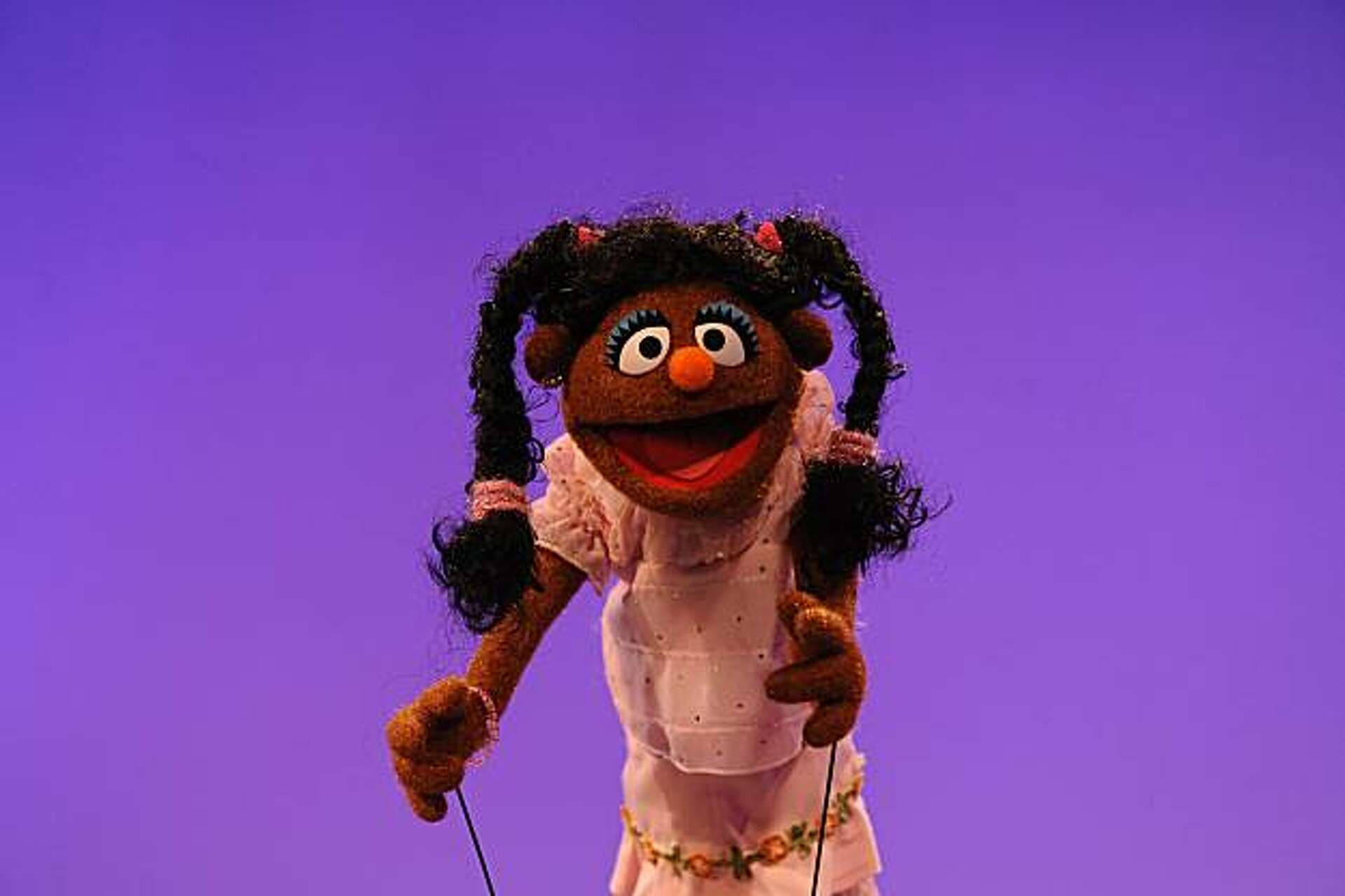 Curly-haired Muppet is role model for little girls