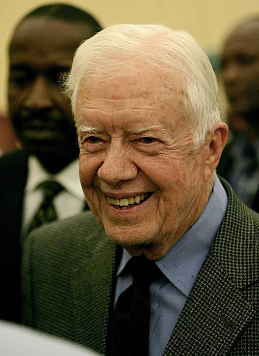 Jimmy Carter treated after falling ill on plane