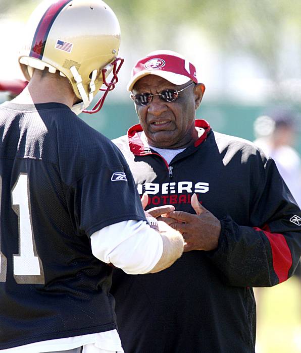 49ers take different path, fire play caller Raye