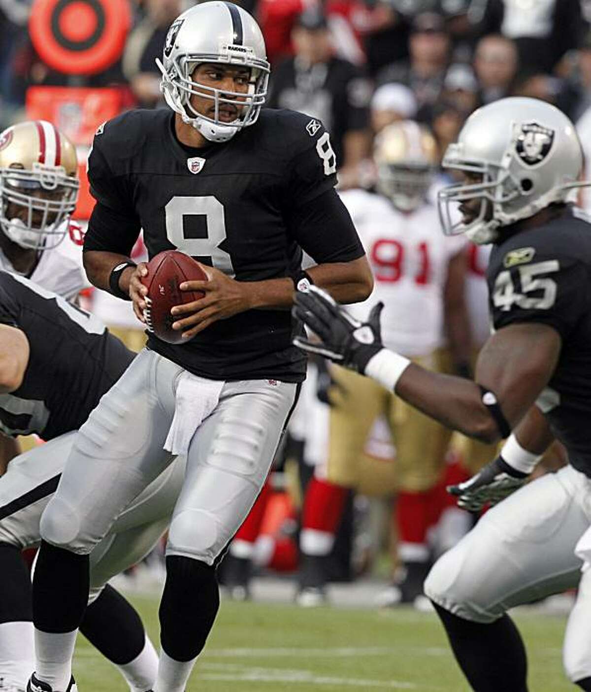 Raiders QB Jason Campbell goes down early