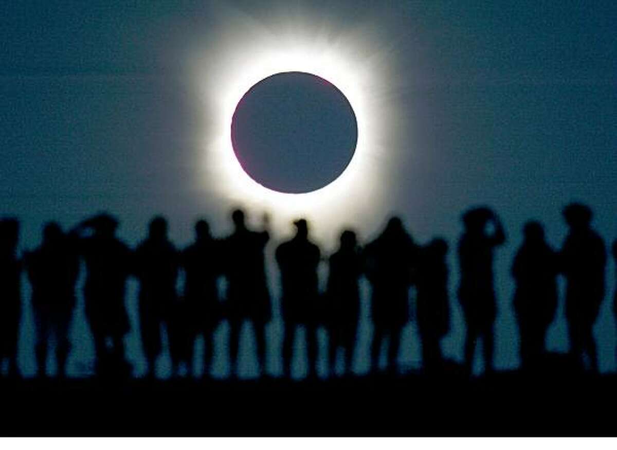 Couple crosses the world chasing solar eclipses