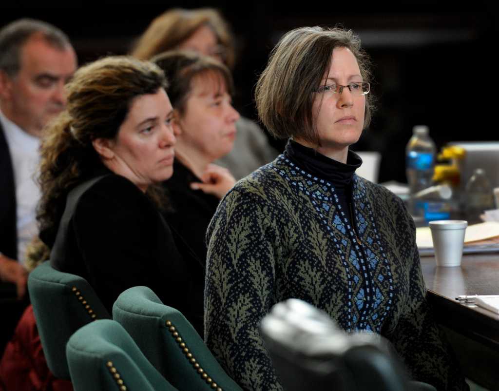 Four acquitted in patient care case