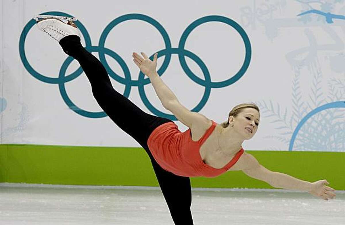 Skater Rochette to compete despite mom's death