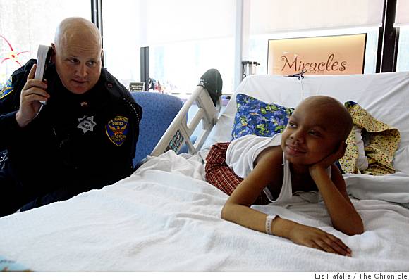 S.F. police officers cheer up kids at UCSF