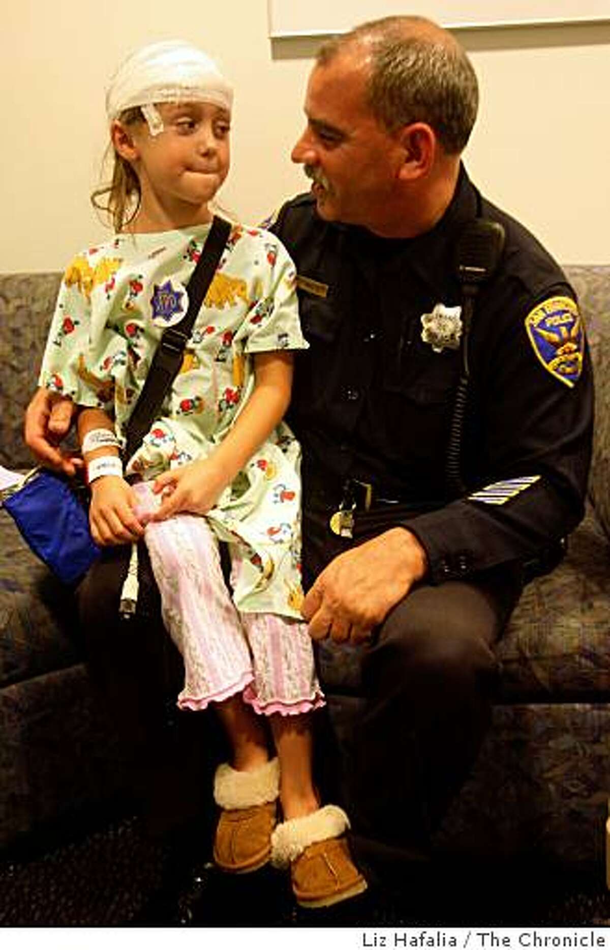 S.F. police officers cheer up kids at UCSF