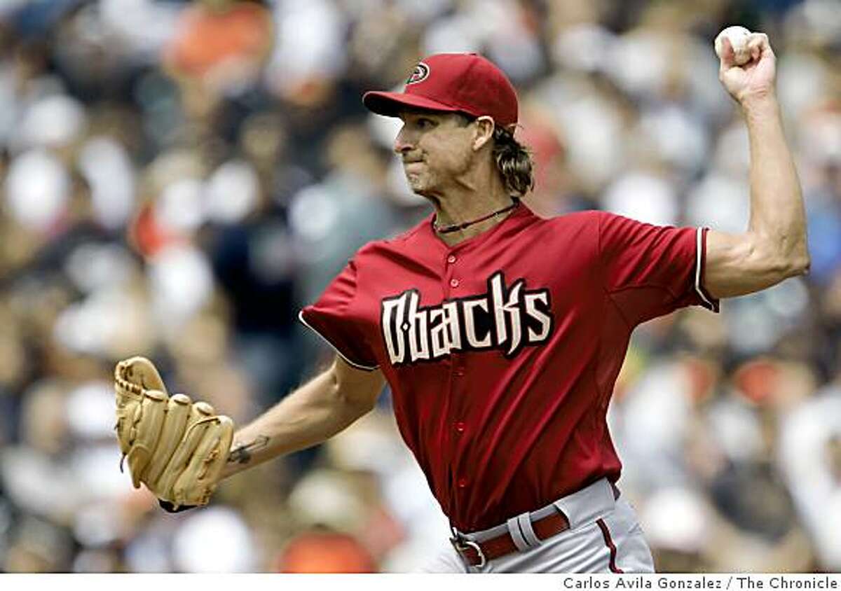 Johnson, D'backs hitters overwhelm Giants