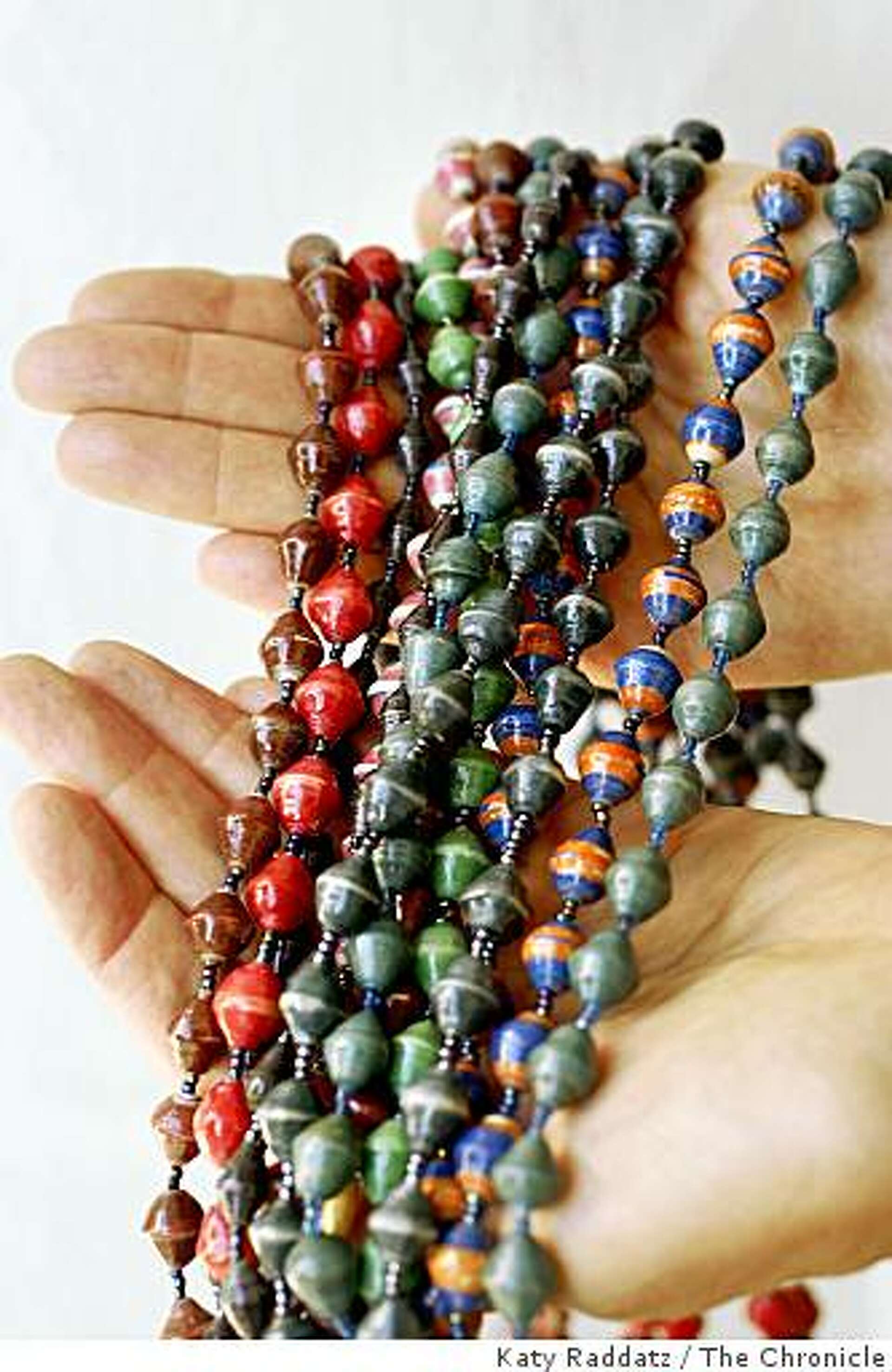 Bead-making helps Ugandan women shed poverty