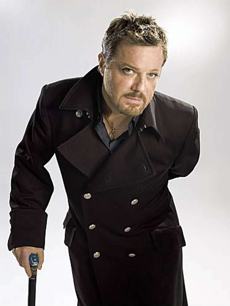 Eddie Izzard performs 'Stripped' of drag garb