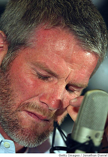 Favre says he's staying retired