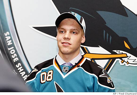 Sharks trade up in draft