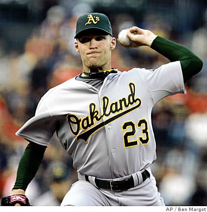 Smith's wild night on mound, at plate