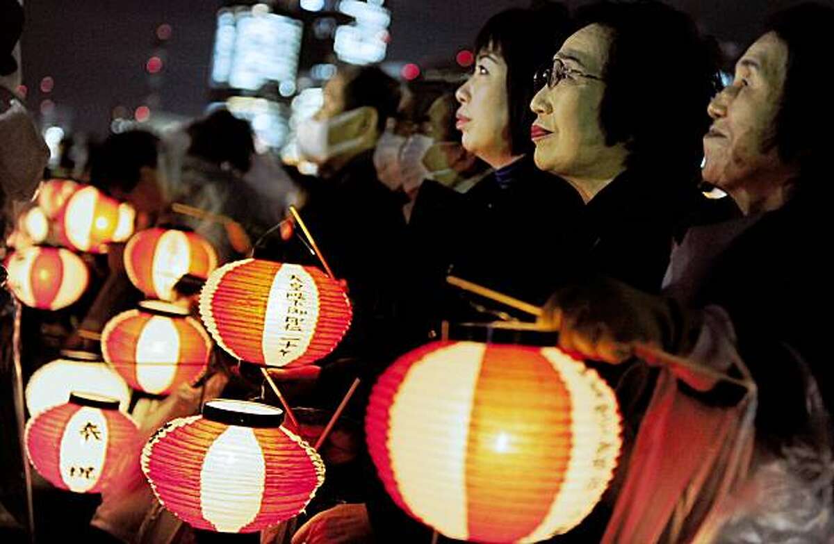 Japan celebrates emperor's 20-year reign