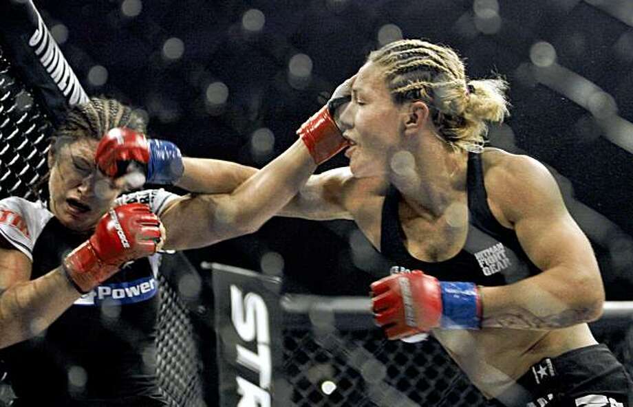 Cyborn knocks out Carano - SFGate