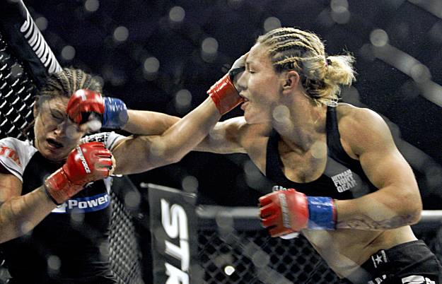 'Cyborg' strikes down Carano in first round