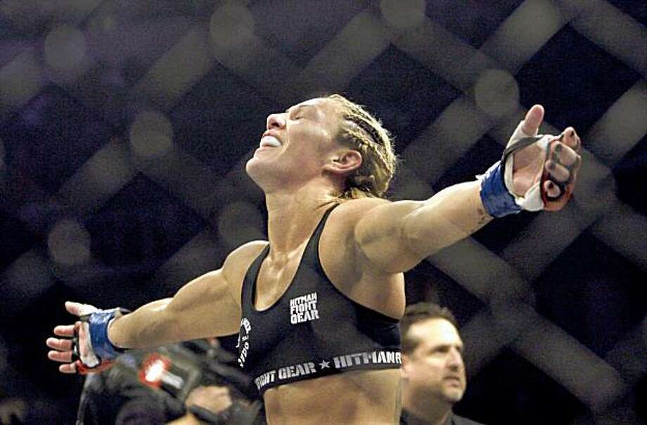 Cyborn knocks out Carano - SFGate