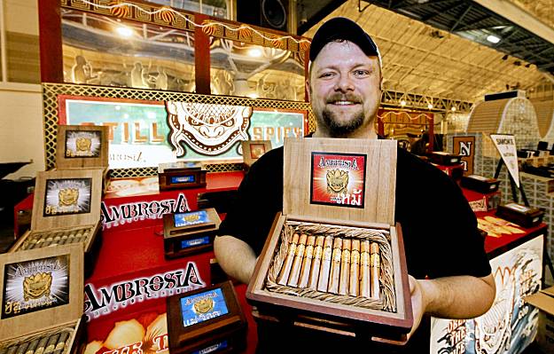Laws, taxes cast haze over cigar shop owners