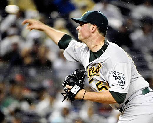 After wait, Mazzaro, A's all wet in N.Y.