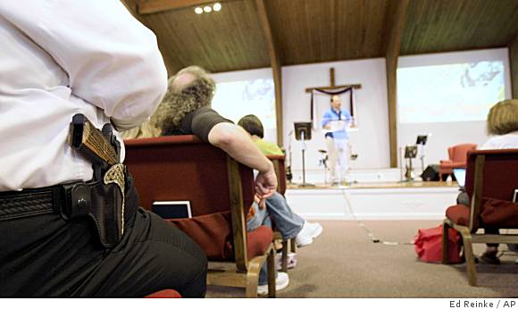 Pastor welcomes 200 for gun event at church