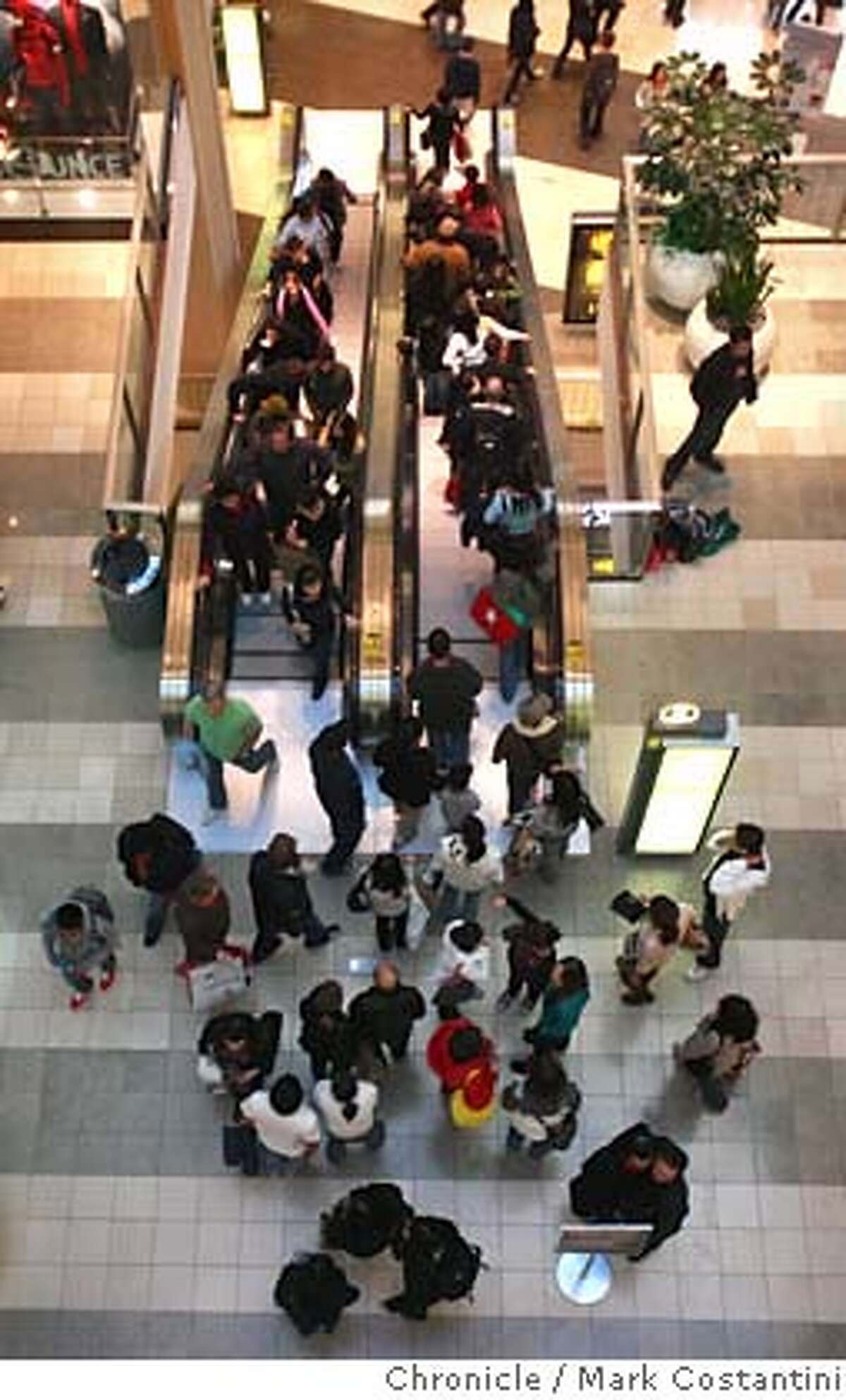 In a growing holiday tradition, shoppers fill stores before sunrise