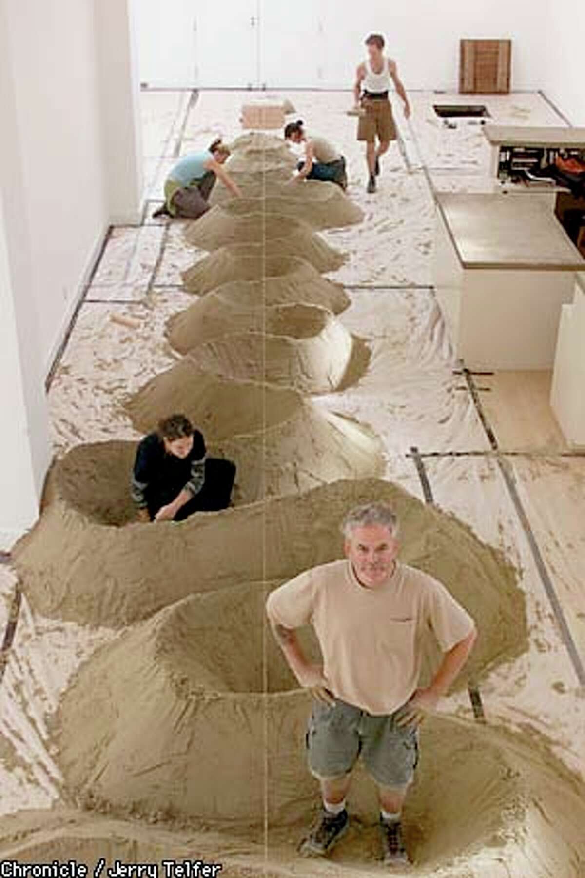 Artist's Message Written in Sand / Goldsworthy's work snakes through Haines