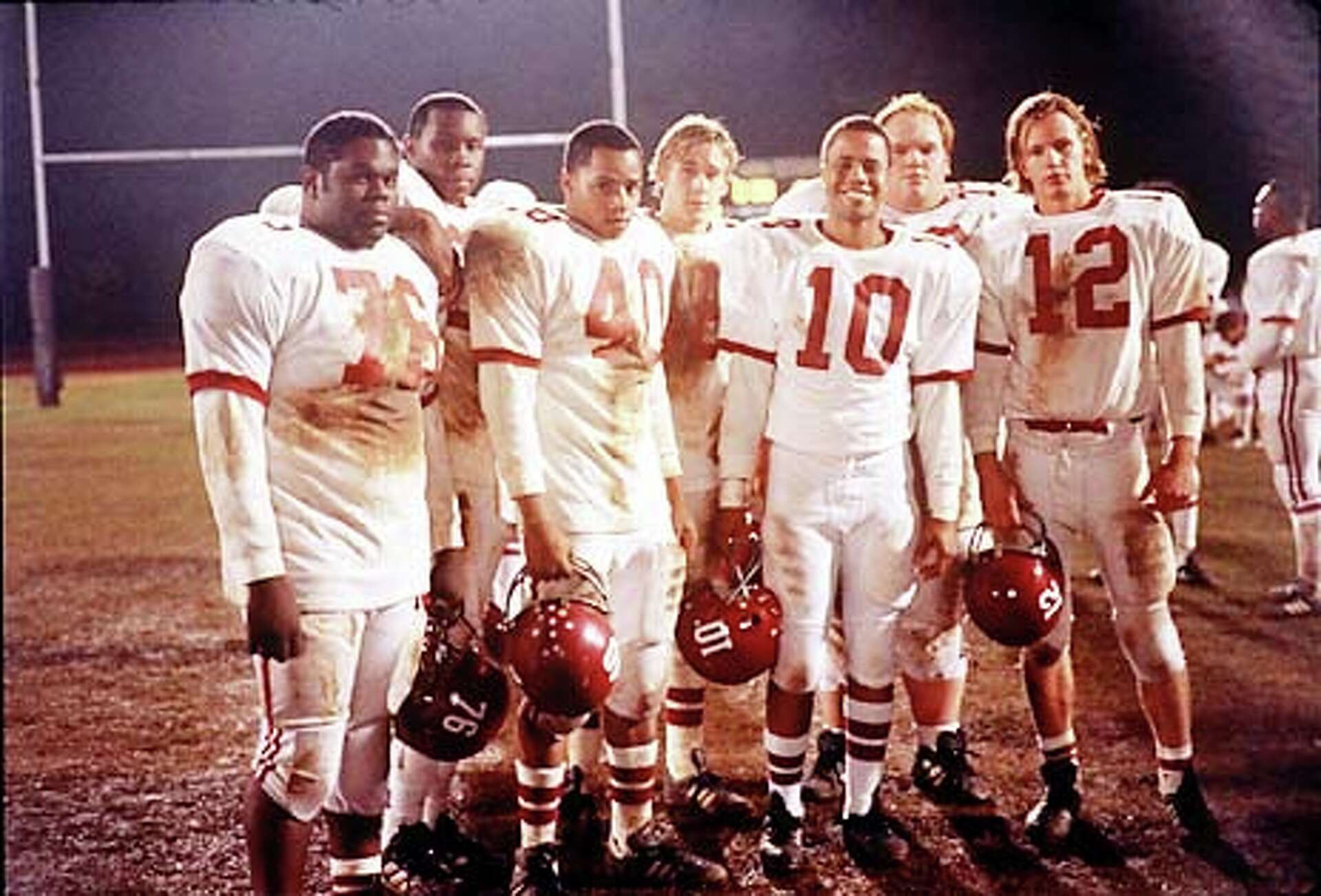 Gaining Ground / Sport bridges racial divide with a minimum of cliches ...