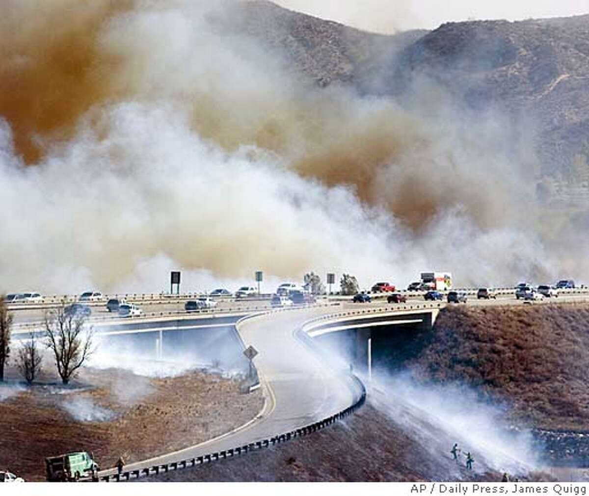 Half a million flee Southern California fires, 1,300 homes burn