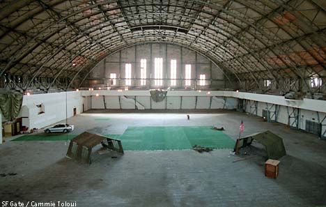 Inside the Belly of the Building / Behind the Armory's deformed brick ...