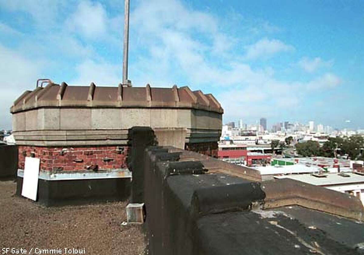 Inside the Belly of the Building / Behind the Armory's deformed brick ...
