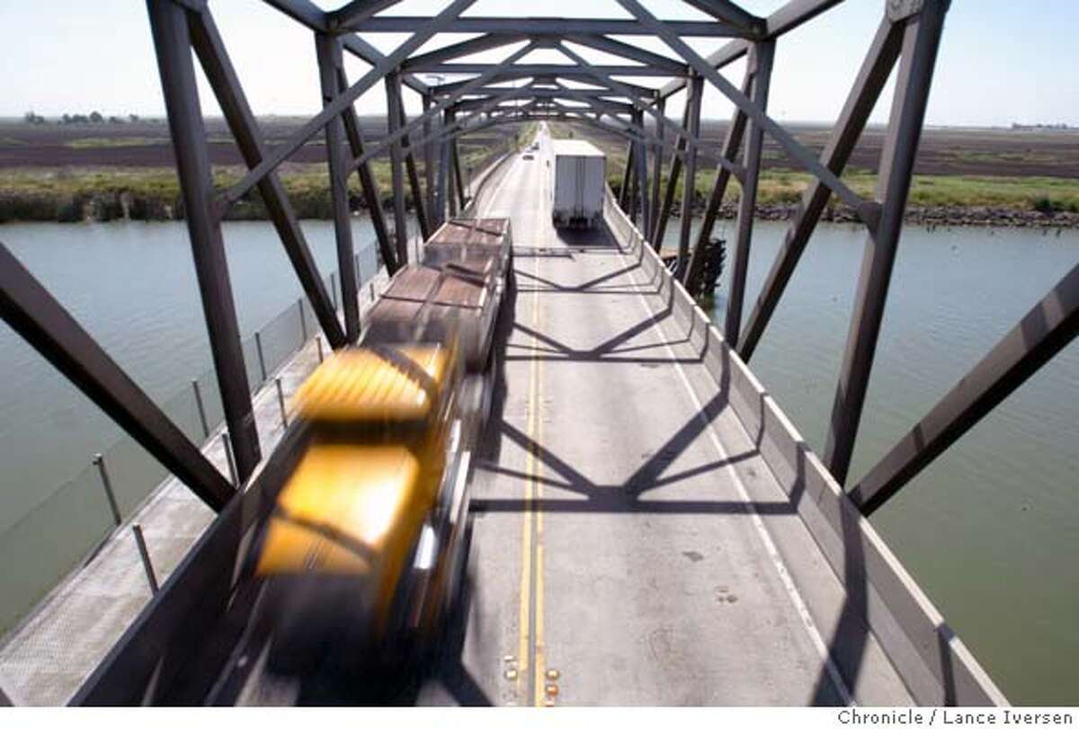 KINGS OF SWING / Delta's utilitarian drawbridges slow down modern world ...