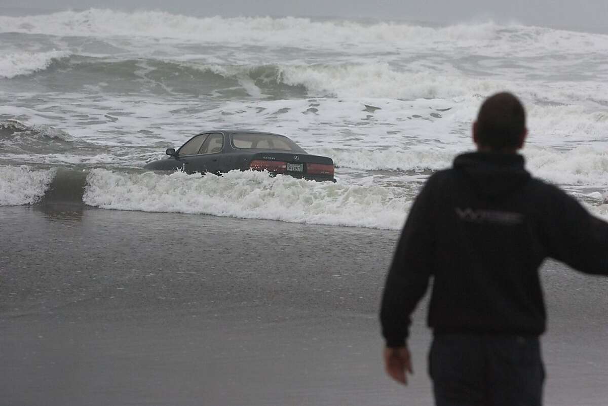 Woman drives car into water at Ocean Beach