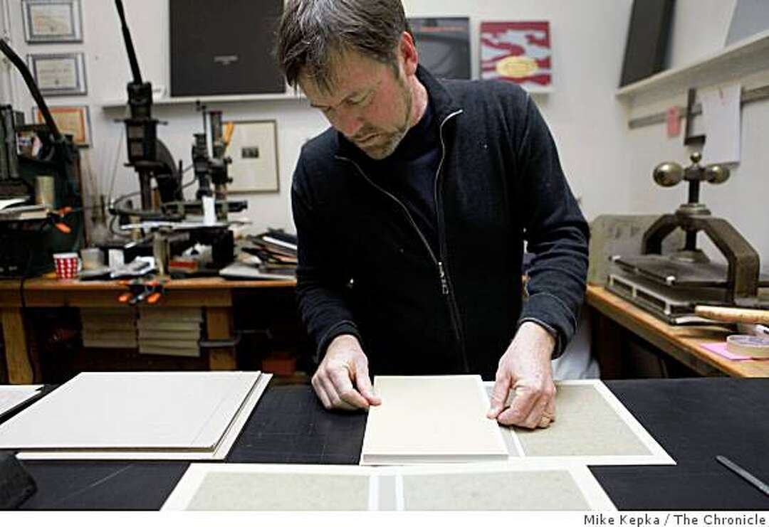 Bookbinder uses 19th century tools