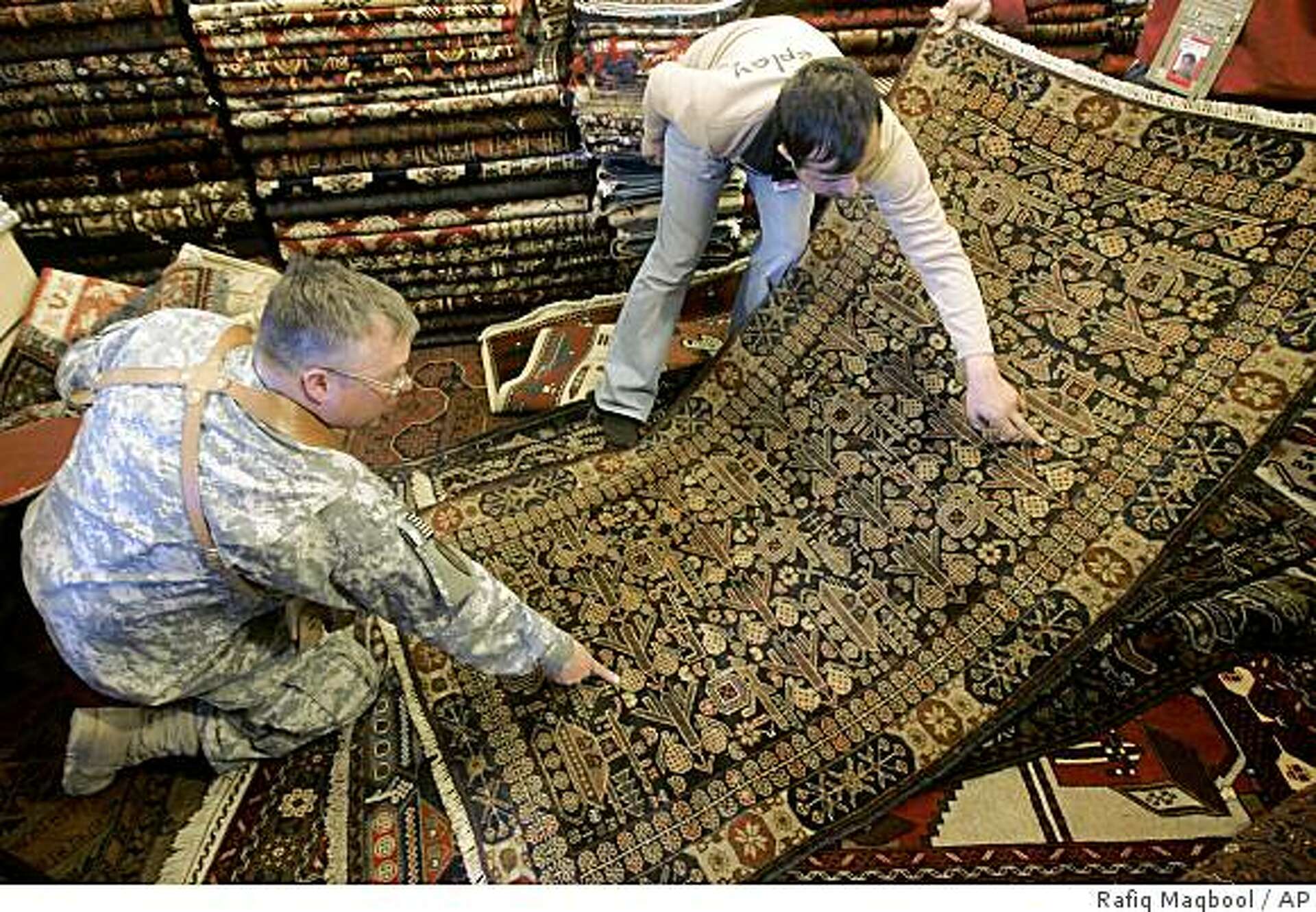Afghan 'war rugs' help struggling economy