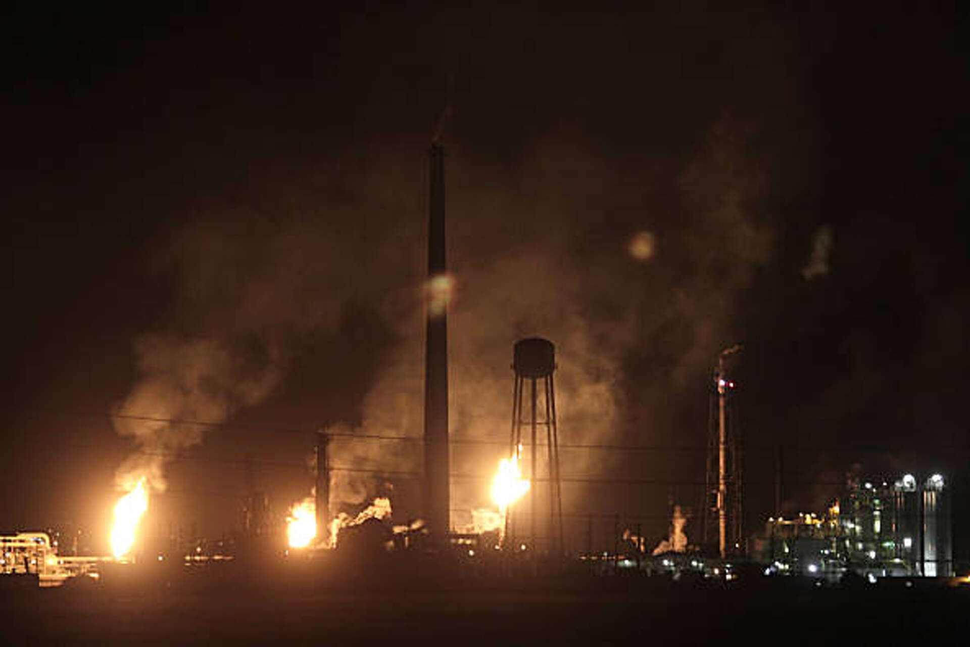 Refinery workers splashed with acid