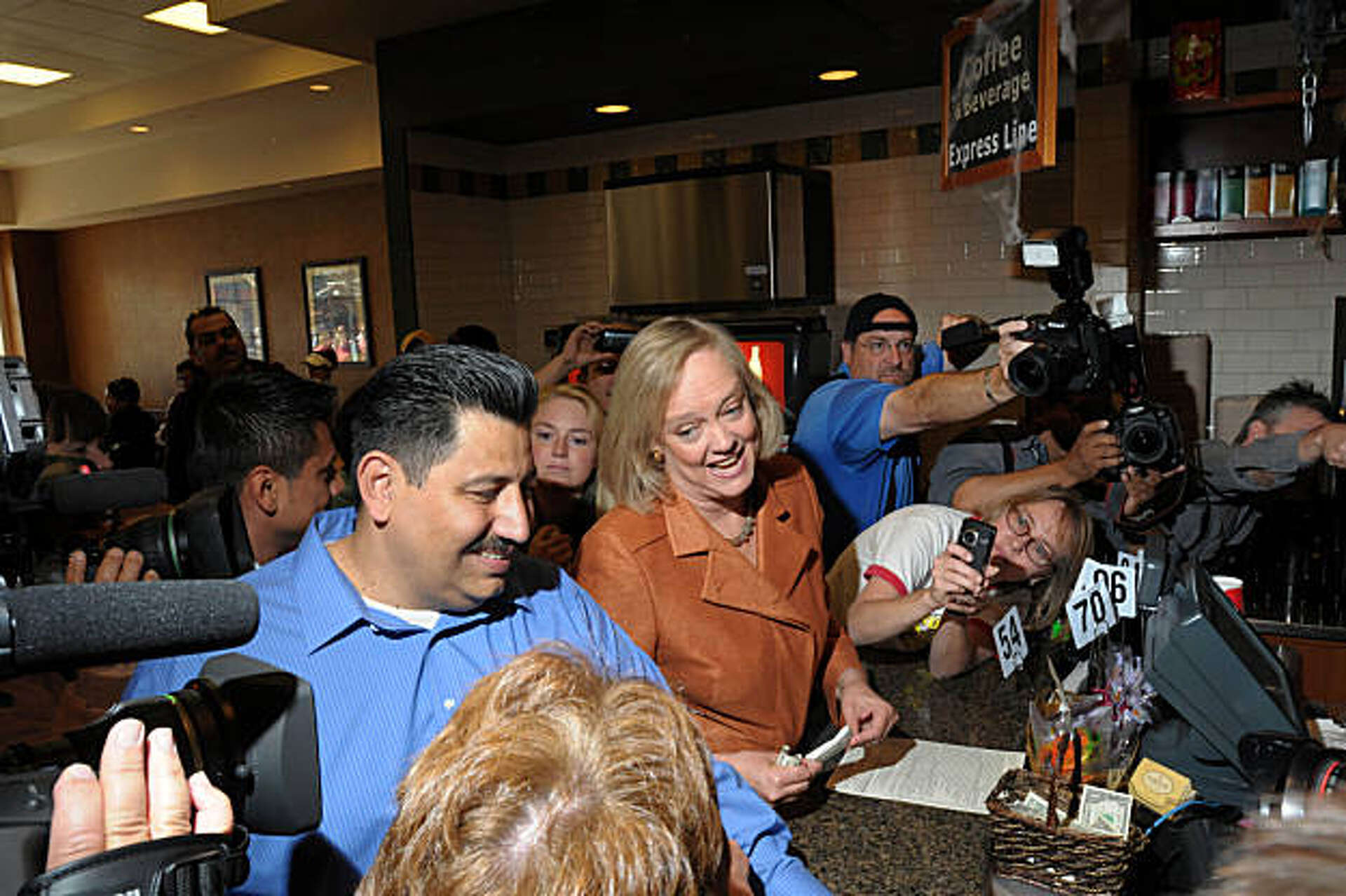 Meg Whitman softens focus in campaign's final days