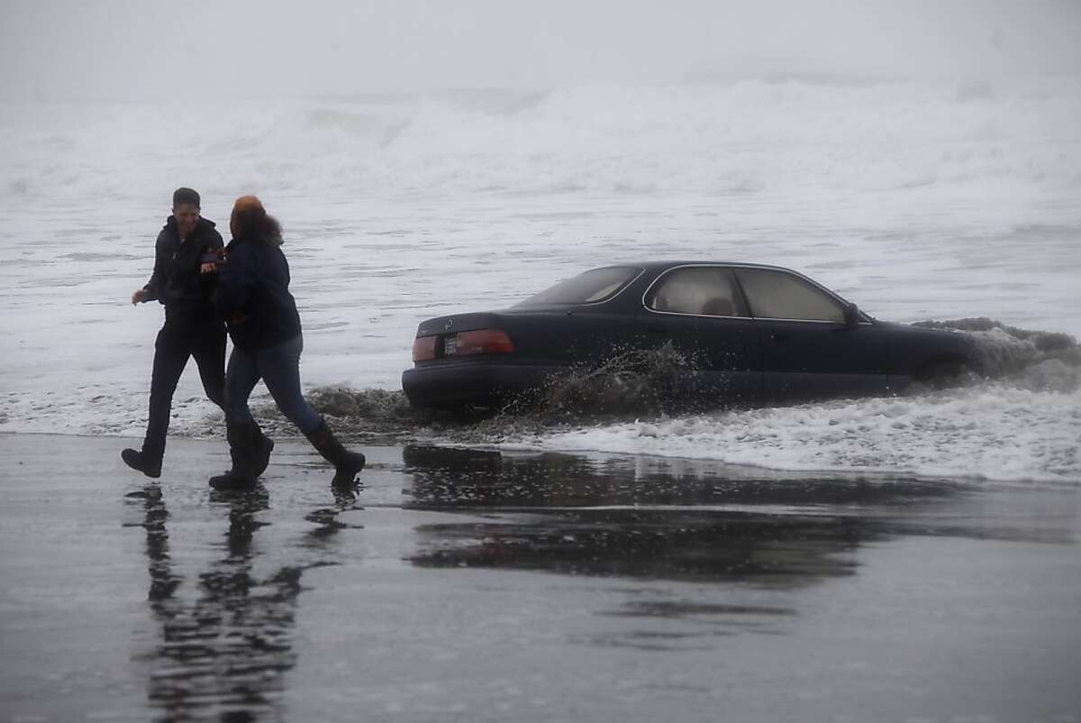 Woman drives car into water at Ocean Beach