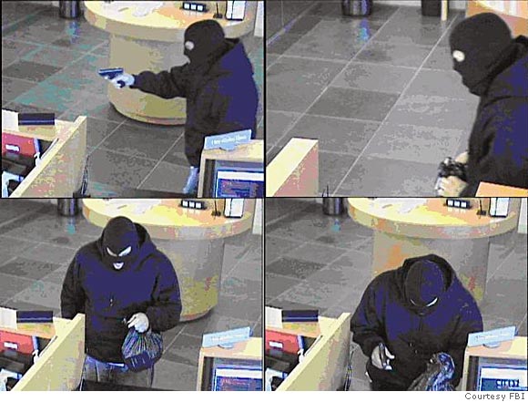One bank-rob suspect held, another sought